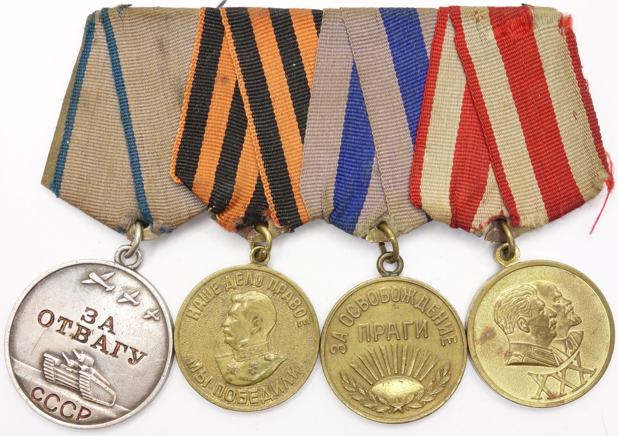 Group of Soviet medals consisting of a Bravery Medal #2598315, Victory ...